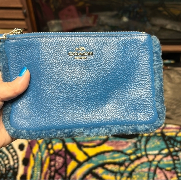 Coach | Bags | Coach Blue Leather Shearling Clutch With Silver Accents ...